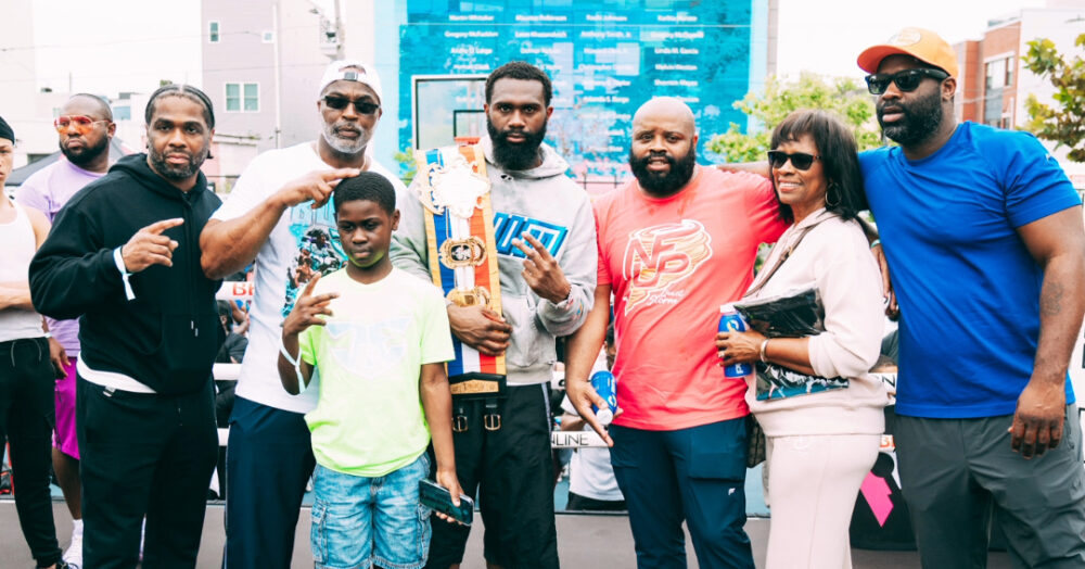 Boots hits the block: Ennis leads hundreds at South Philly community ...