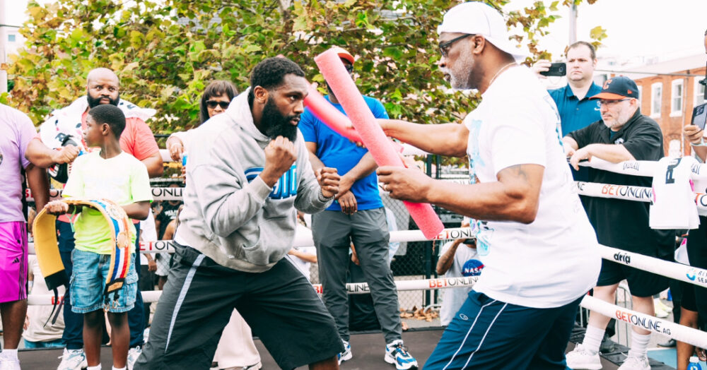 Boots hits the block: Ennis leads hundreds at South Philly community ...